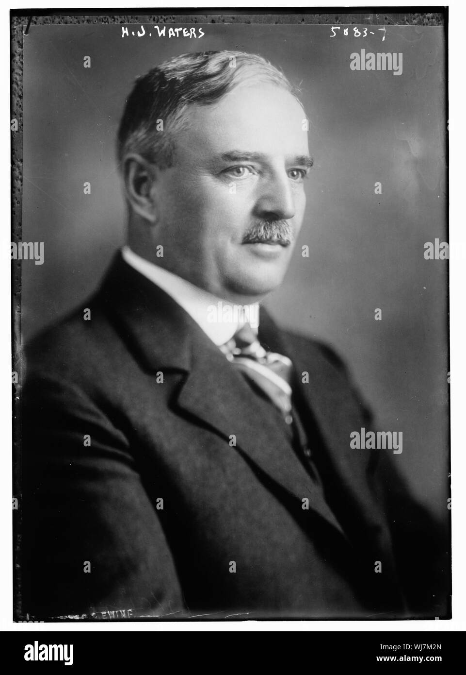 Man waters Black and White Stock Photos & Images - Alamy
