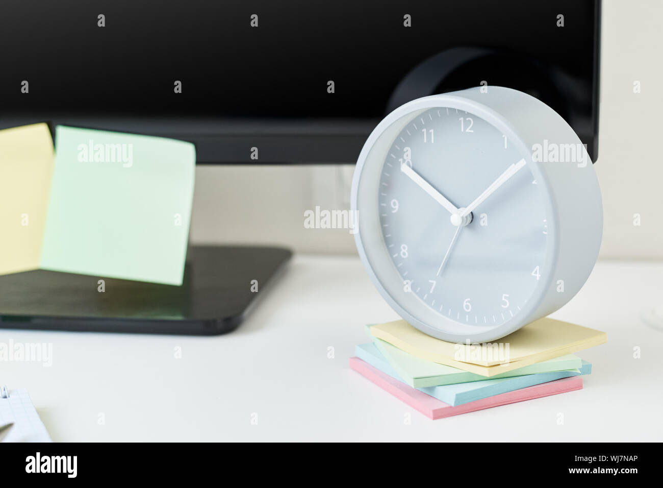 Modern workspace background. Workplace with a clock, office supplies ...