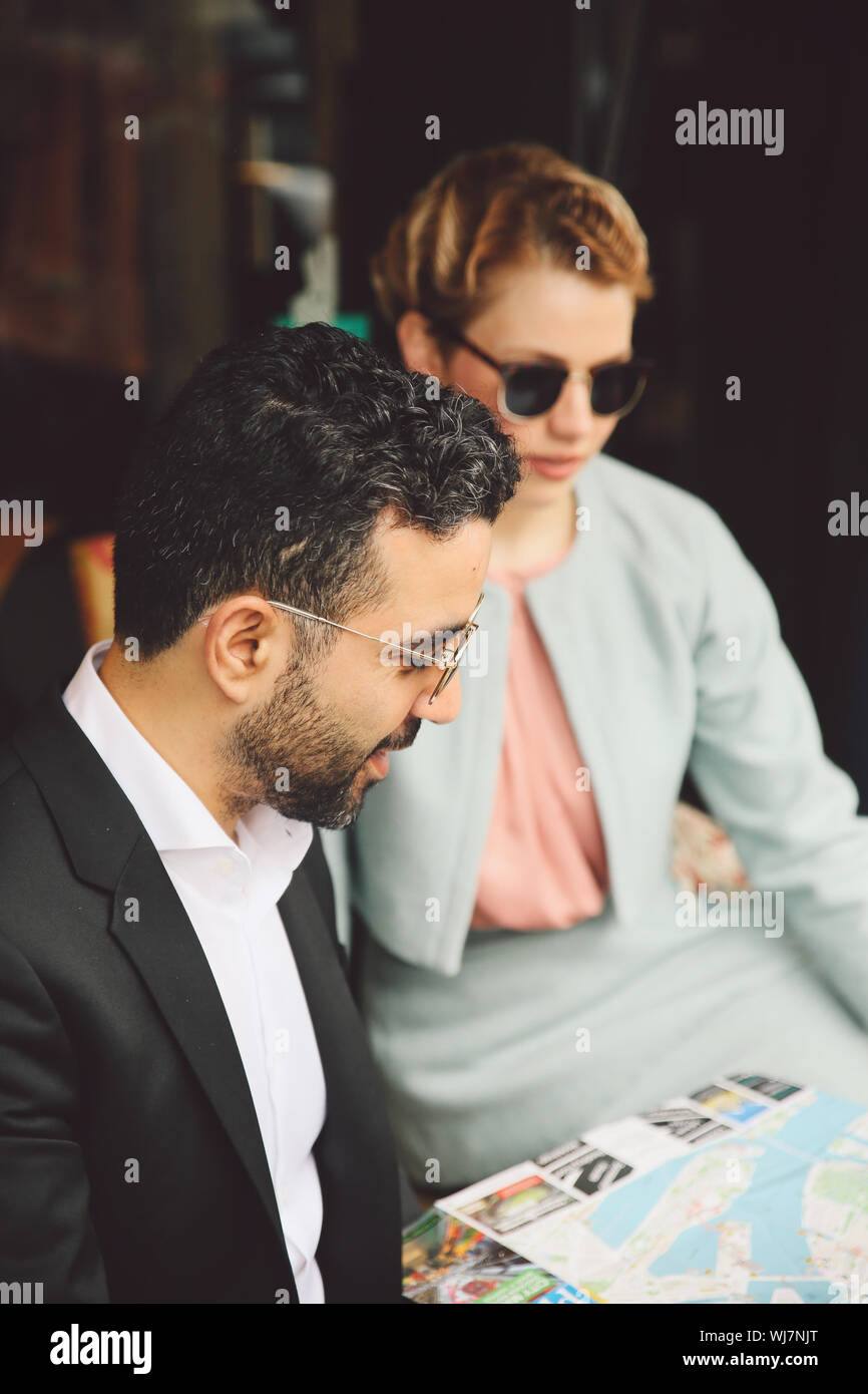 Two people reading map hi-res stock photography and images - Alamy