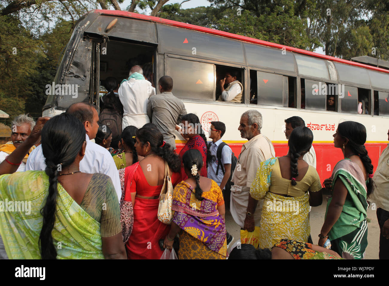India, Karnataka, Hassan, Passengers boarding a bus in Hassan Stock ...