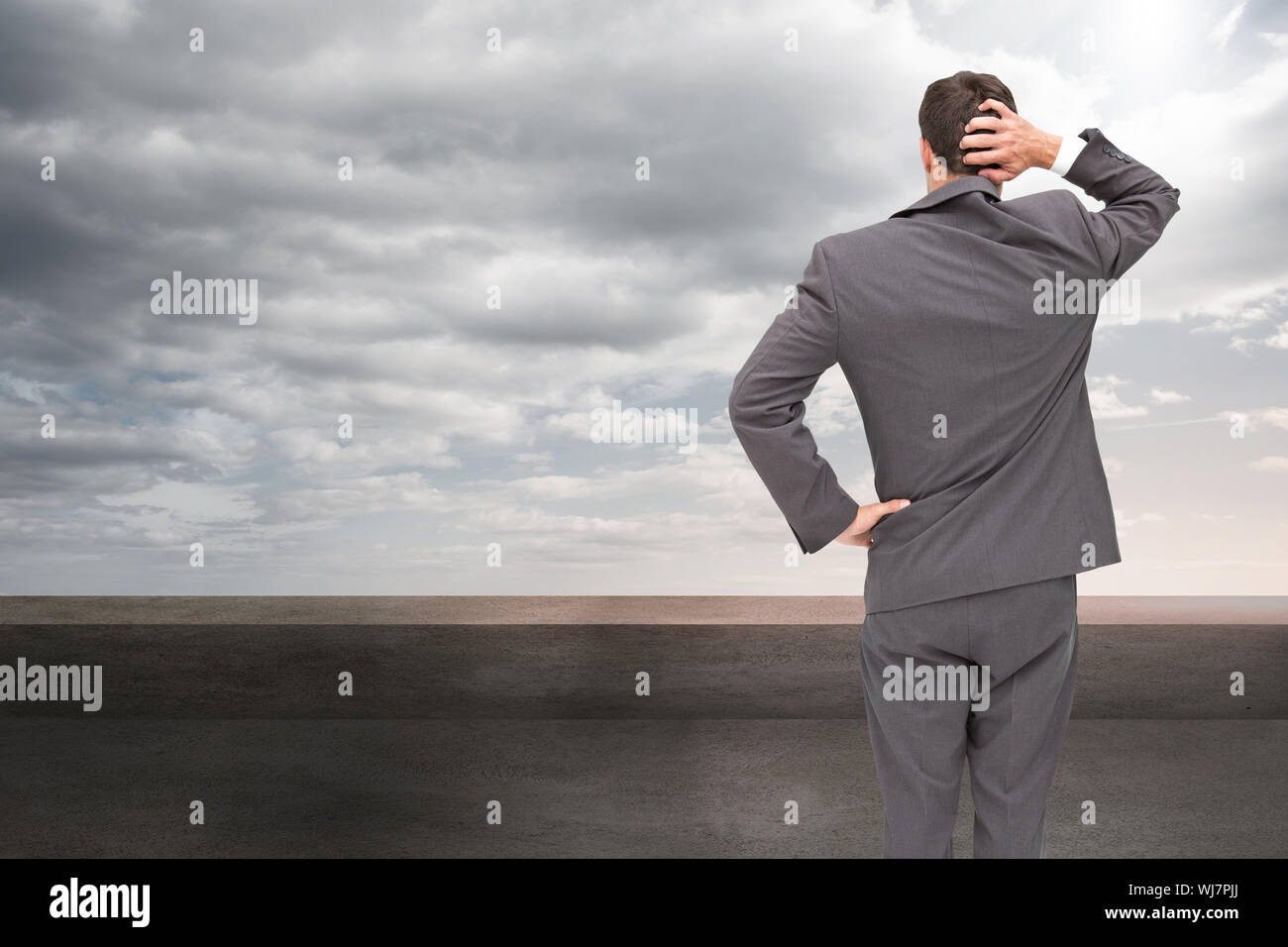 Man scratching head back hi-res stock photography and images - Alamy
