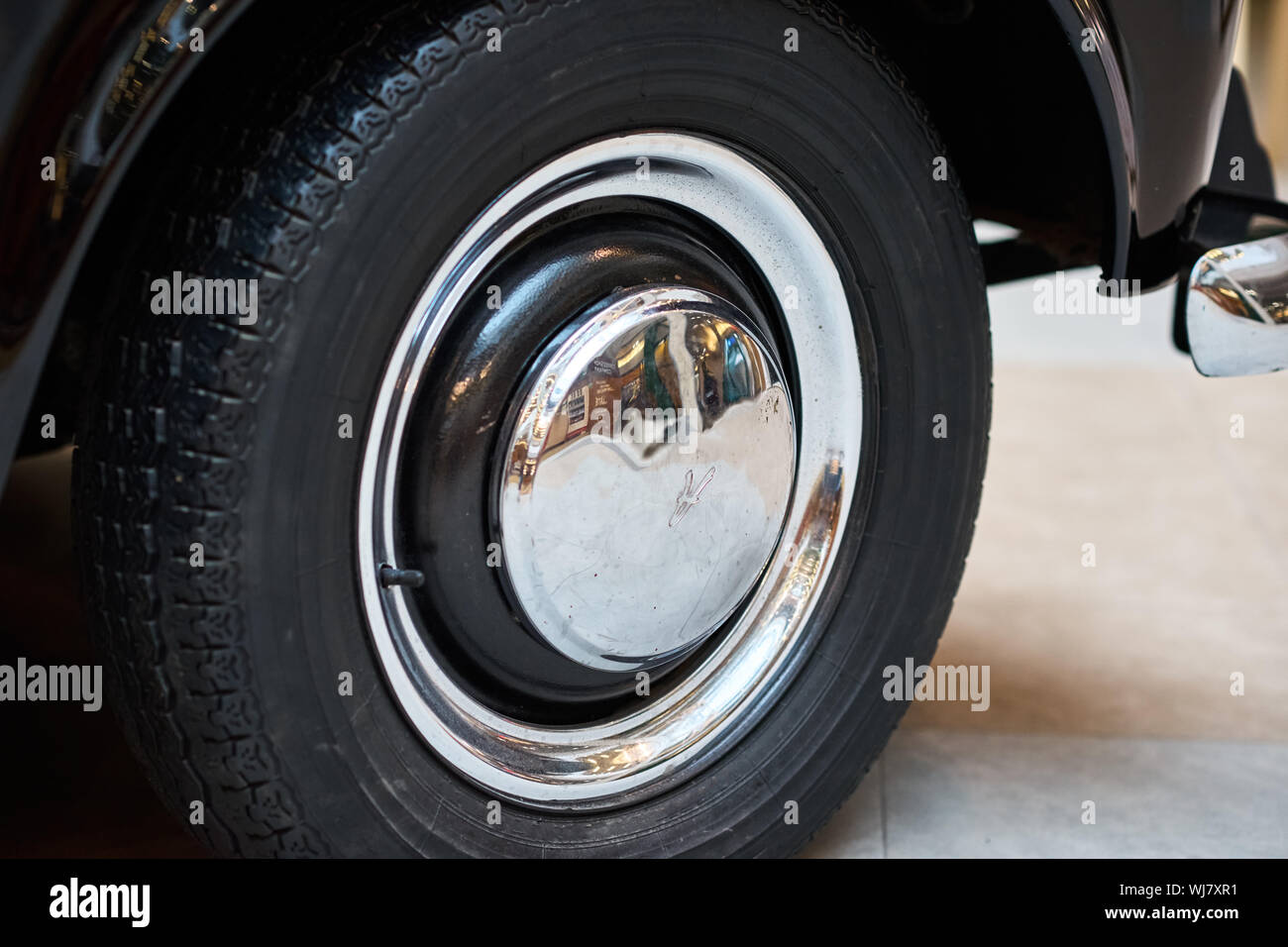 Vintage wheel with protector of retro car, closeup Stock Photo - Alamy
