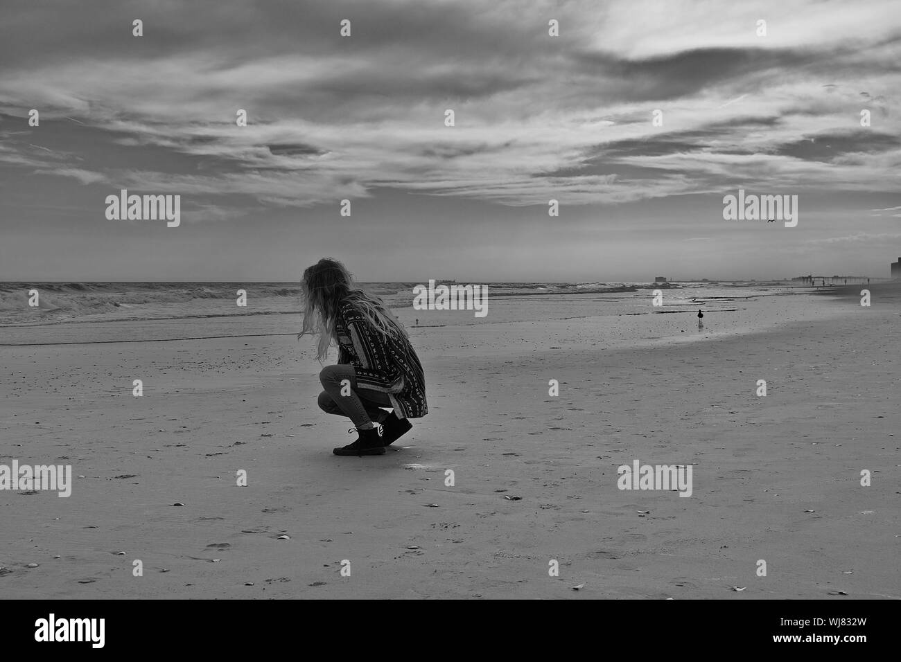 Crouching woman Black and White Stock Photos & Images - Alamy