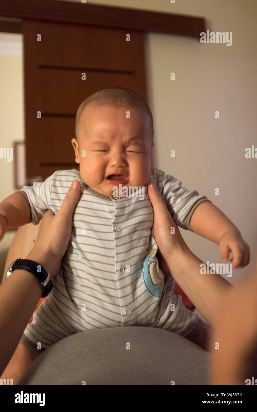 Crying child and parent hi-res stock photography and images - Alamy