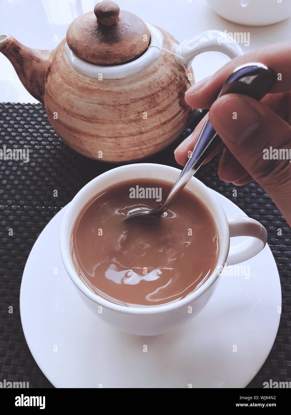 Stirring Tea Cup High Resolution Stock Photography and Images - Alamy