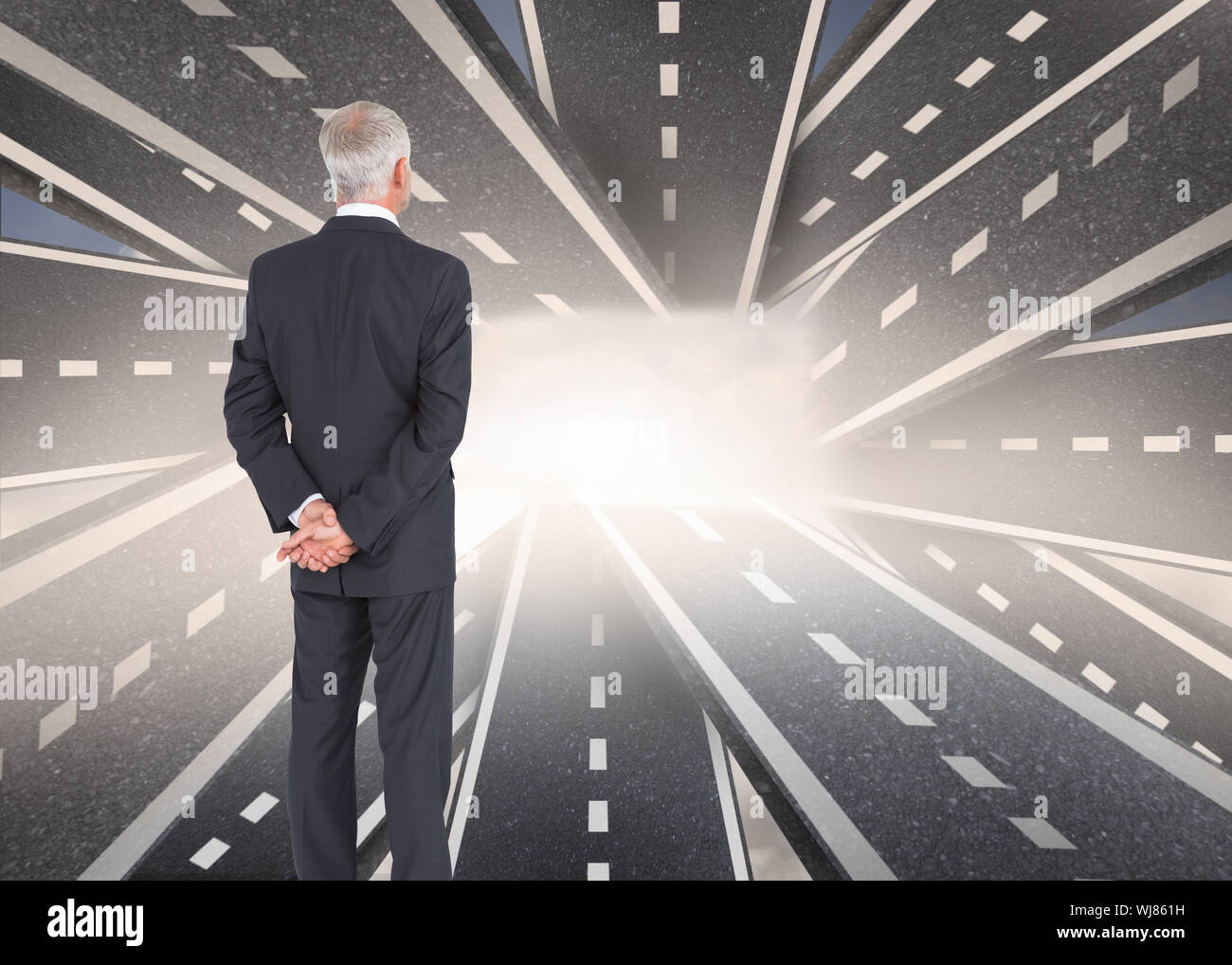 Mature businessman crossing hands hi-res stock photography and images ...