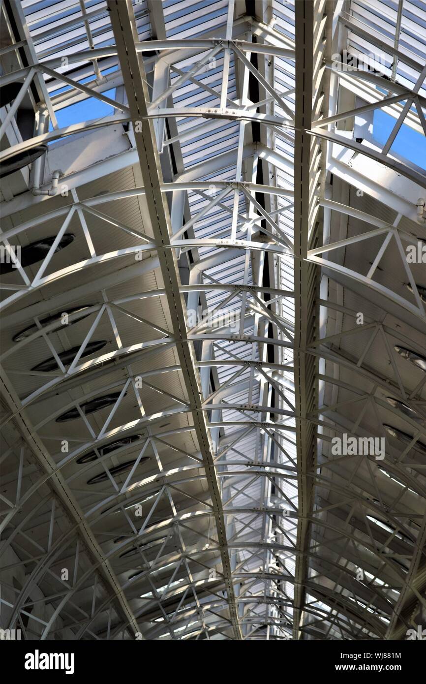 Vertical low angle shot of a ceiling with metal frames and roof at ...