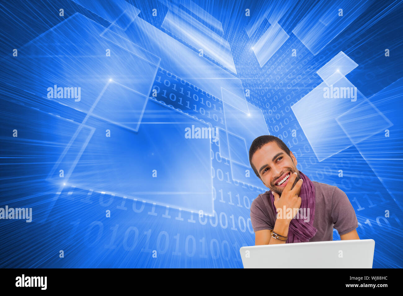 Composite image of thinking man sitting on floor using laptop and ...