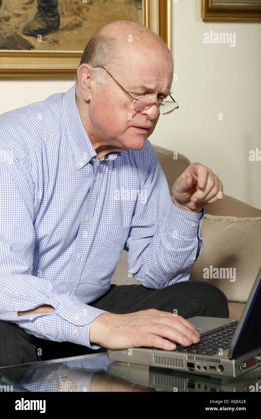 old man with laptop Stock Photo - Alamy