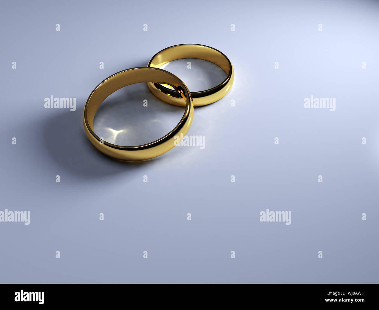 An image of two classic golden wedding rings Stock Photo - Alamy
