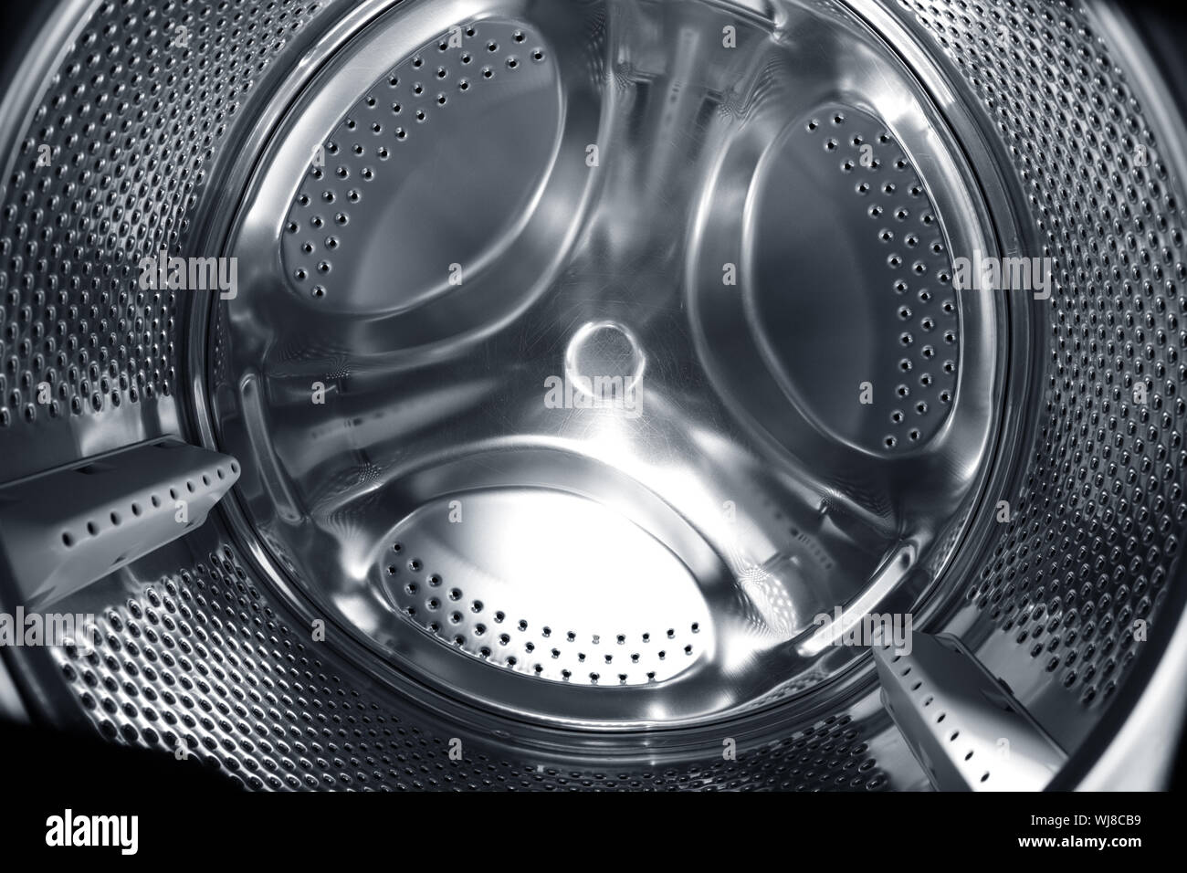 Metal circular element of washing machine. Close-up photo Stock Photo ...