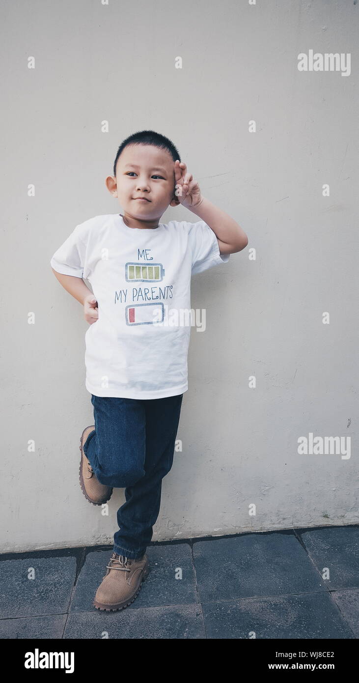 One boy standing hi-res stock photography and images - Alamy