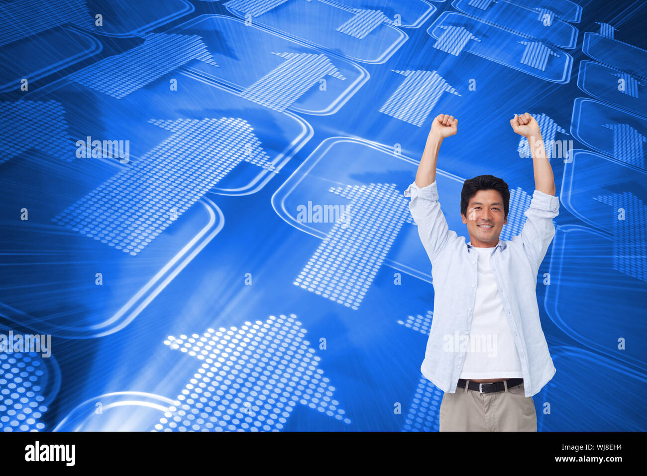 Composite image of cheering male with arms up Stock Photo - Alamy