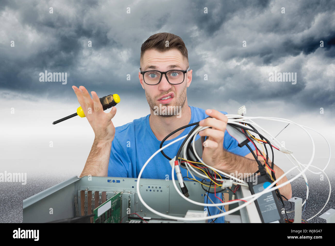 Confused looking computer technician hi-res stock photography and ...