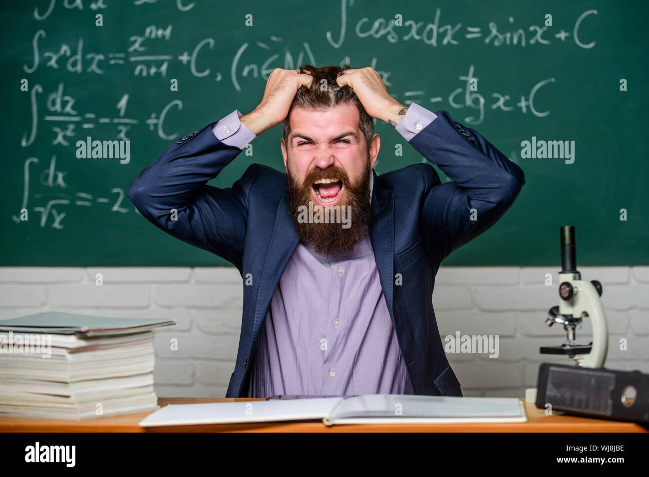 Exhausted teacher hi-res stock photography and images - Alamy