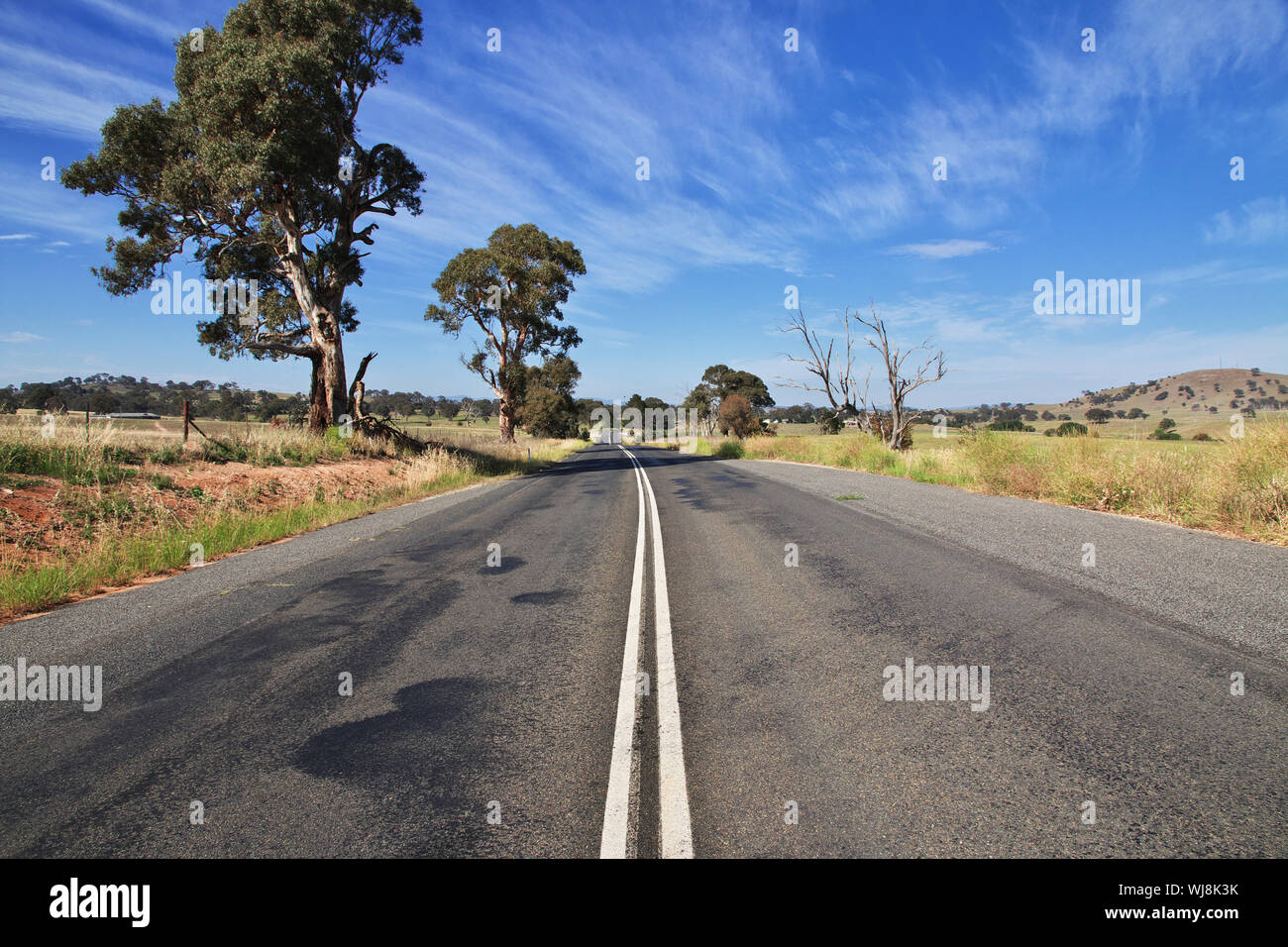 The road is in a rural location, Australia Stock Photo - Alamy