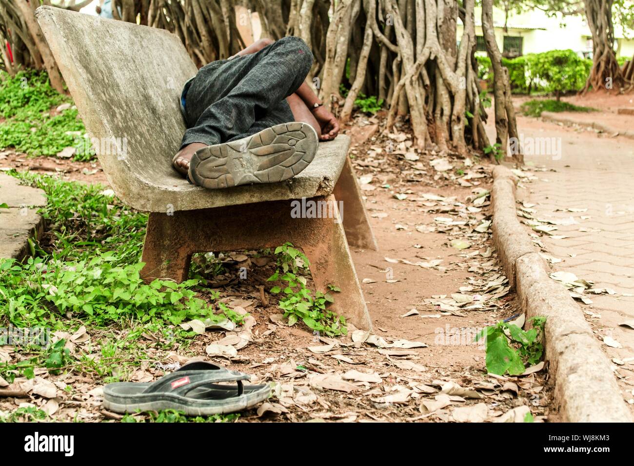 Man lying bench hi-res stock photography and images - Alamy