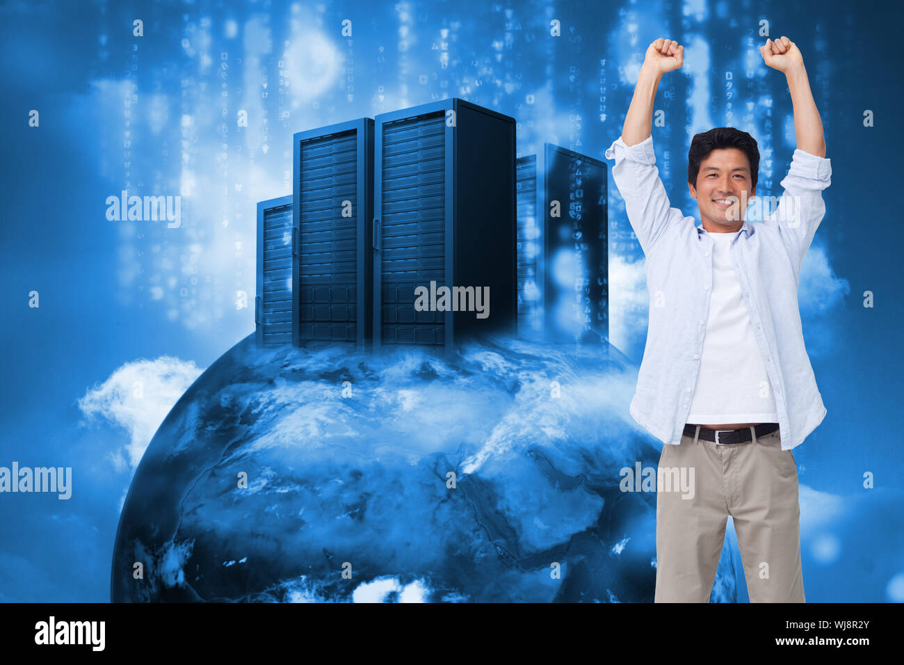 Composite image of cheering male with arms up Stock Photo - Alamy