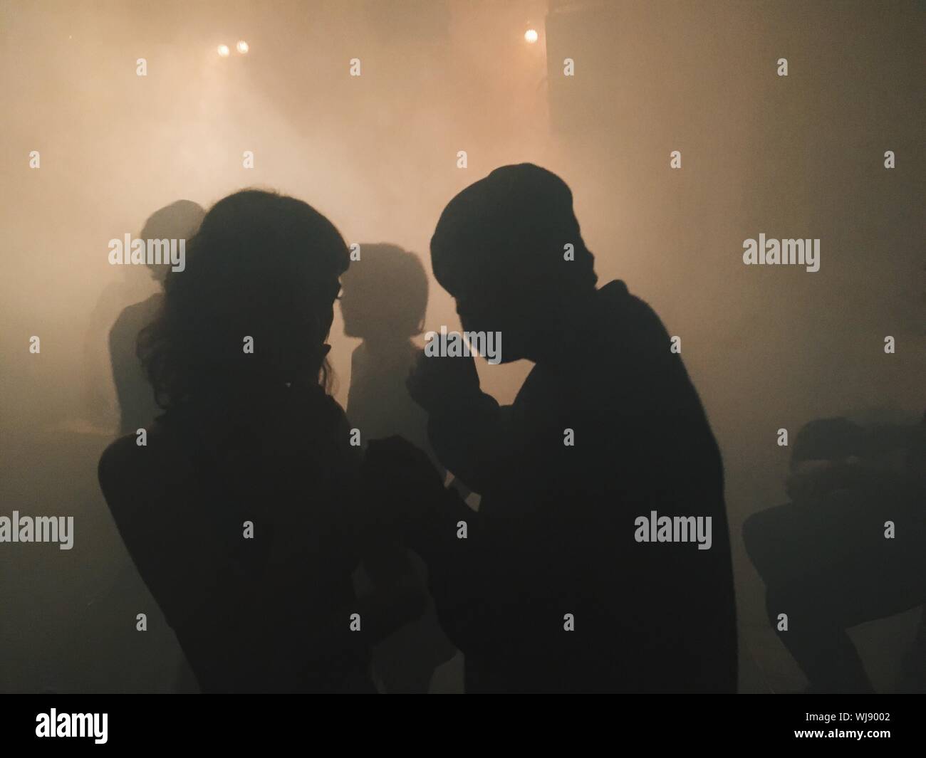 Black standing next to each other hi-res stock photography and images ...