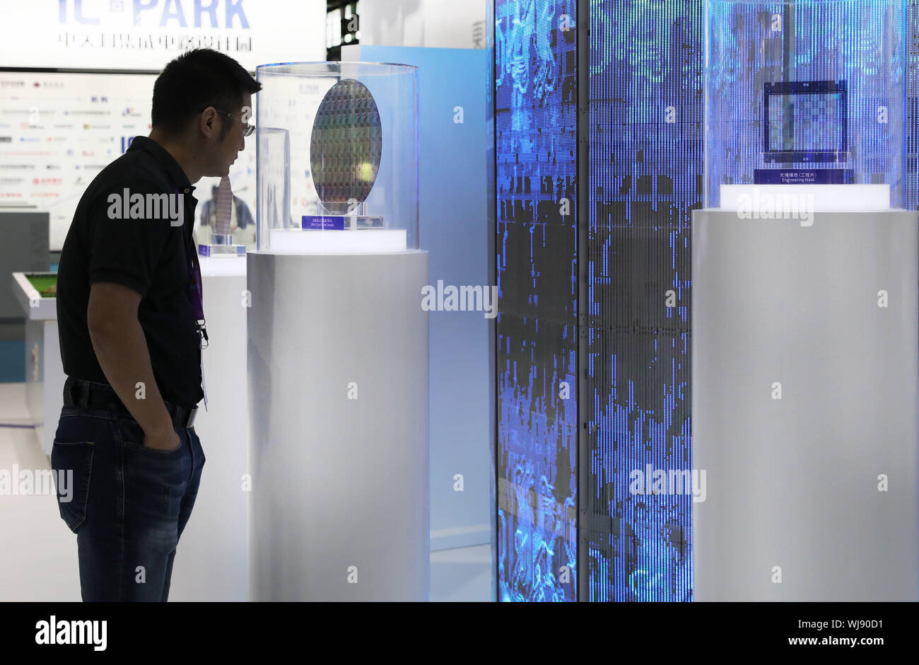 Shanghai, China. 3rd Sep, 2019. A visitor views the exhibits during the ...