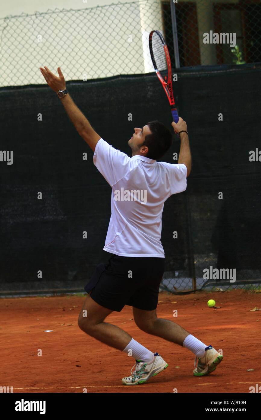 Adult Men Playing Tennis High Resolution Stock Photography and Images ...