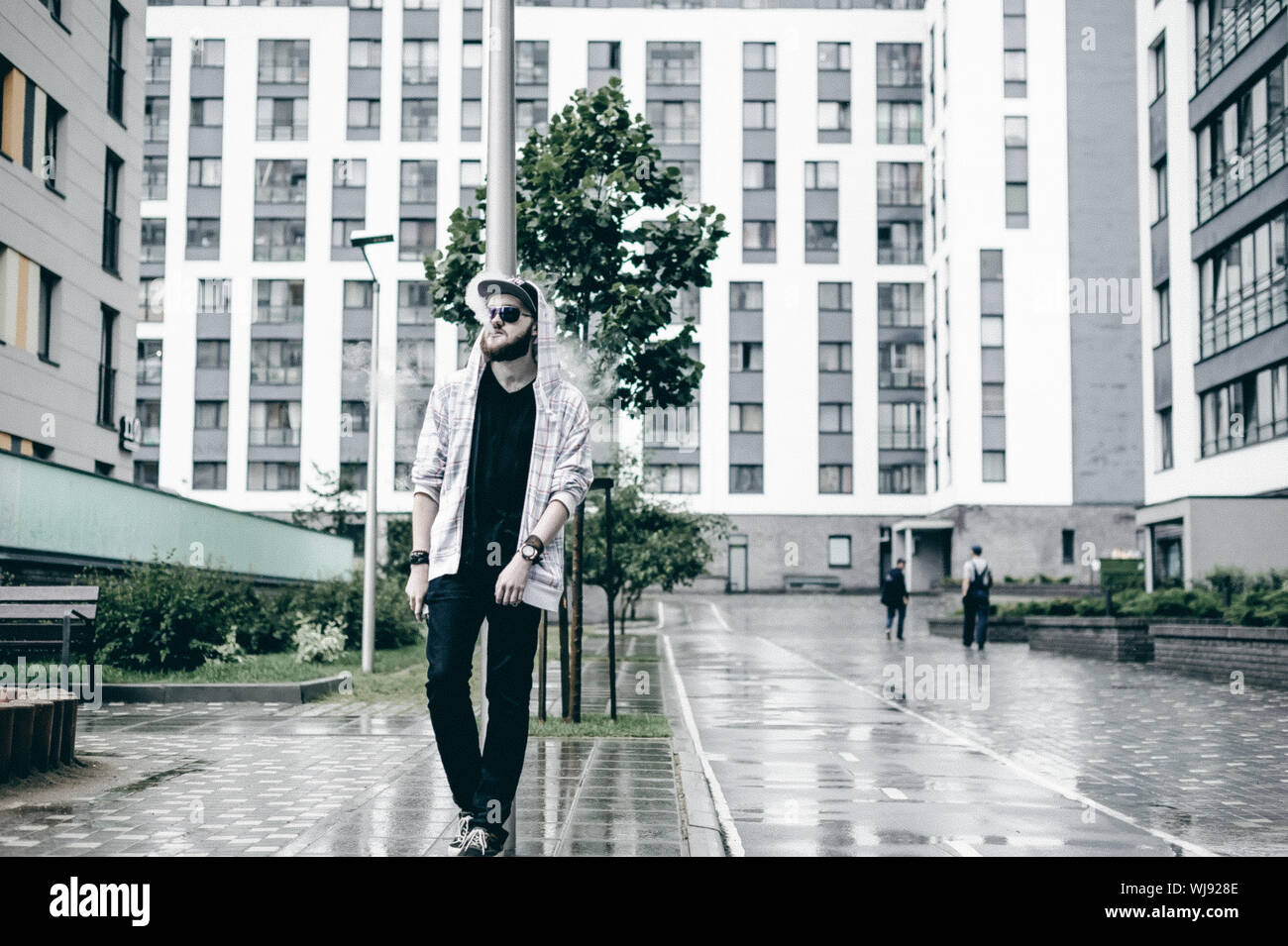 Rainy day man smoking hi-res stock photography and images - Alamy