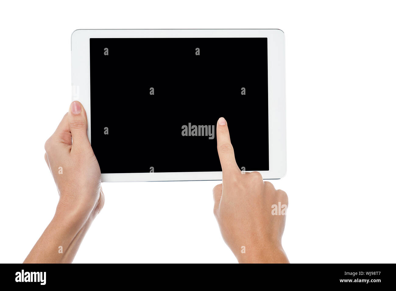 Womans finger pointing on tablet screen Stock Photo - Alamy