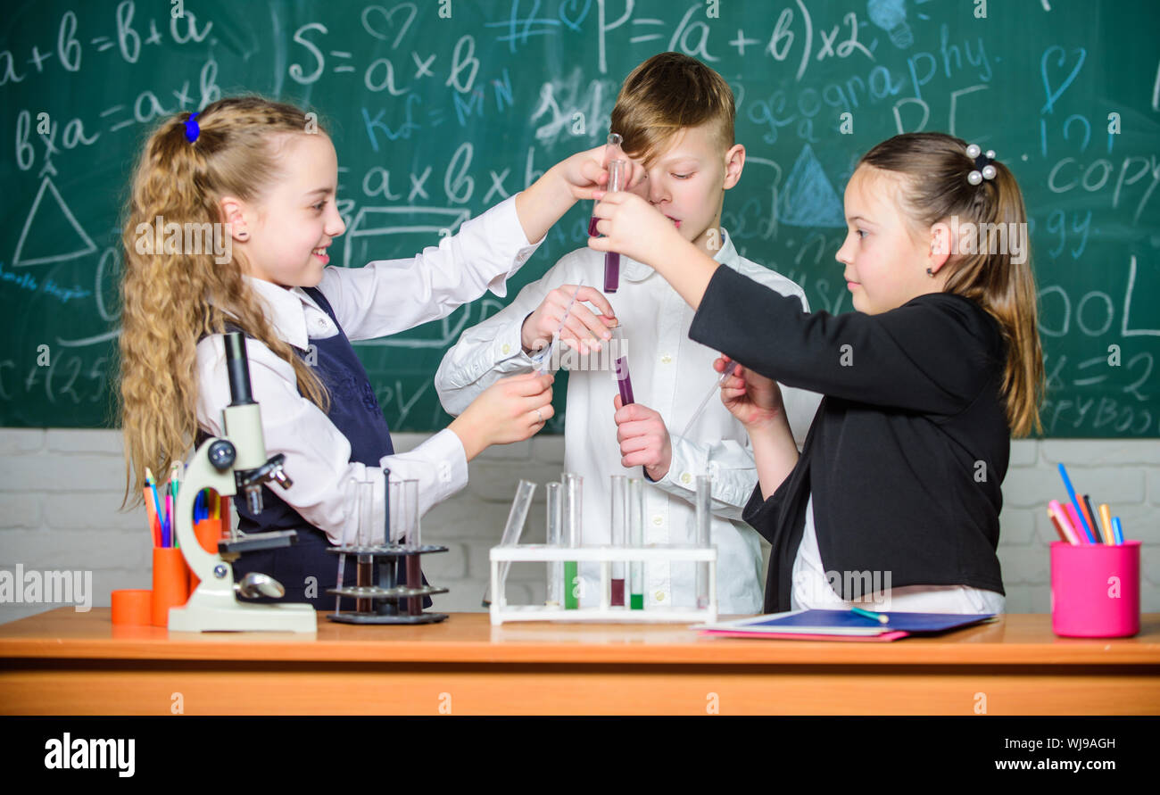 Little children. Science. biology experiments with microscope. Little ...