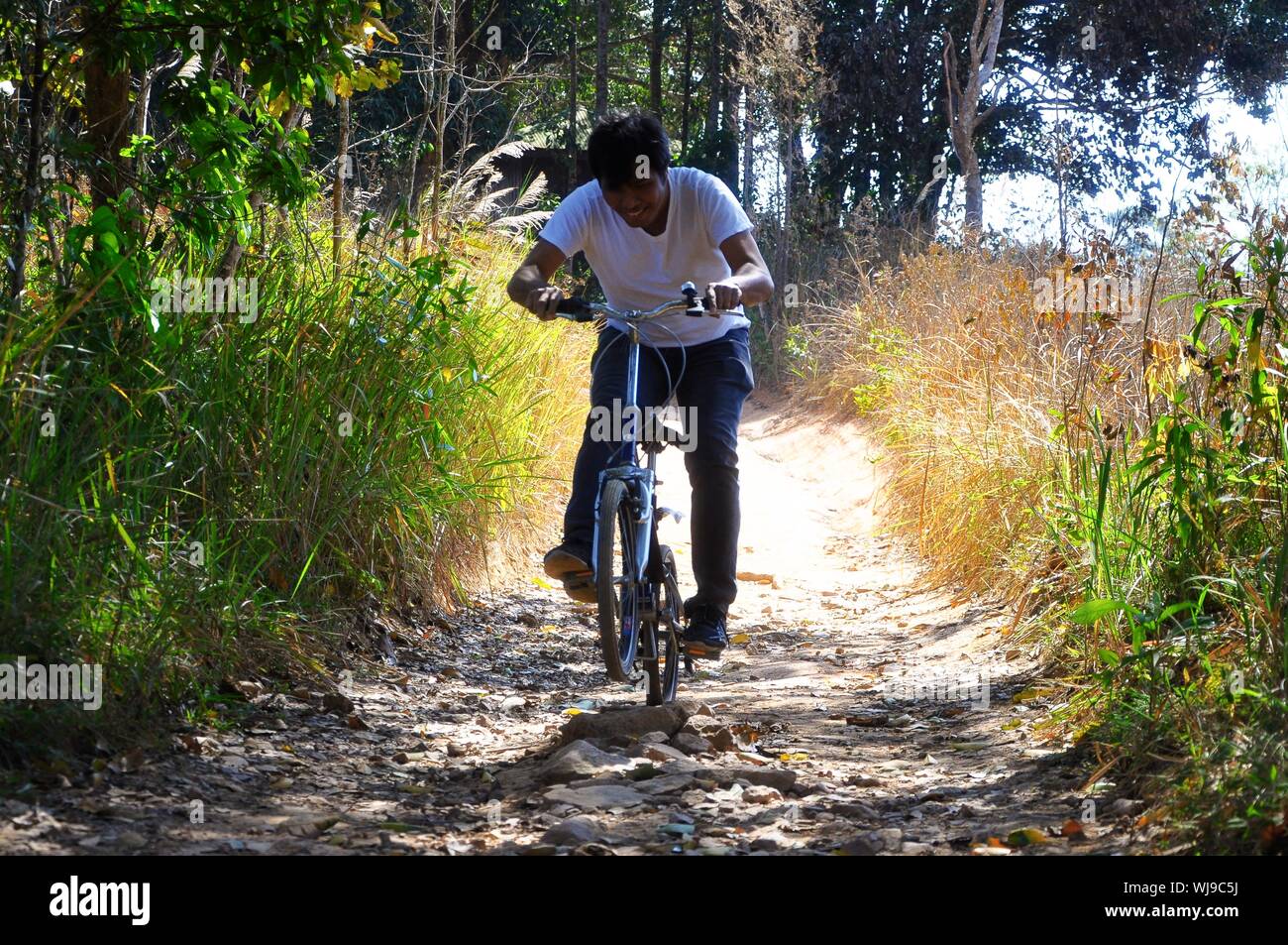 Indian man on bicycle hi-res stock photography and images - Alamy