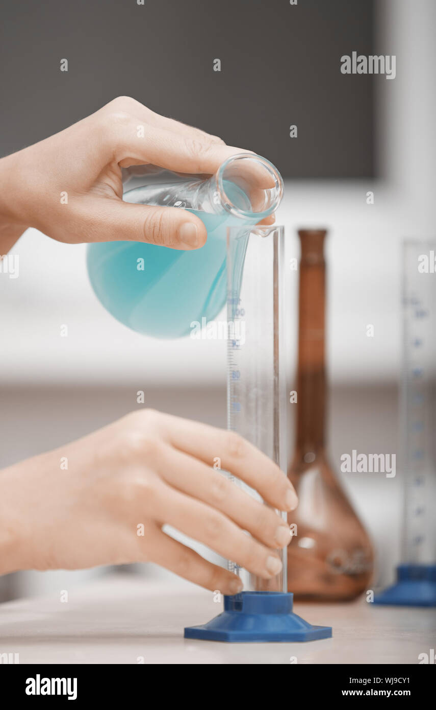 Human hands working in chemical laboratory Stock Photo - Alamy