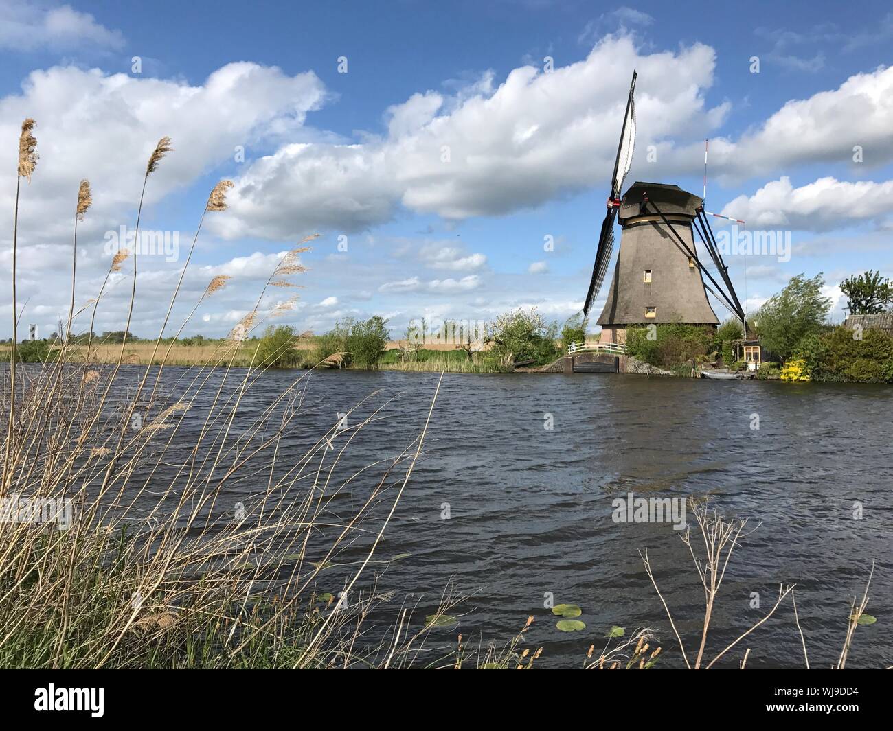 Windmill and lake hi-res stock photography and images - Alamy
