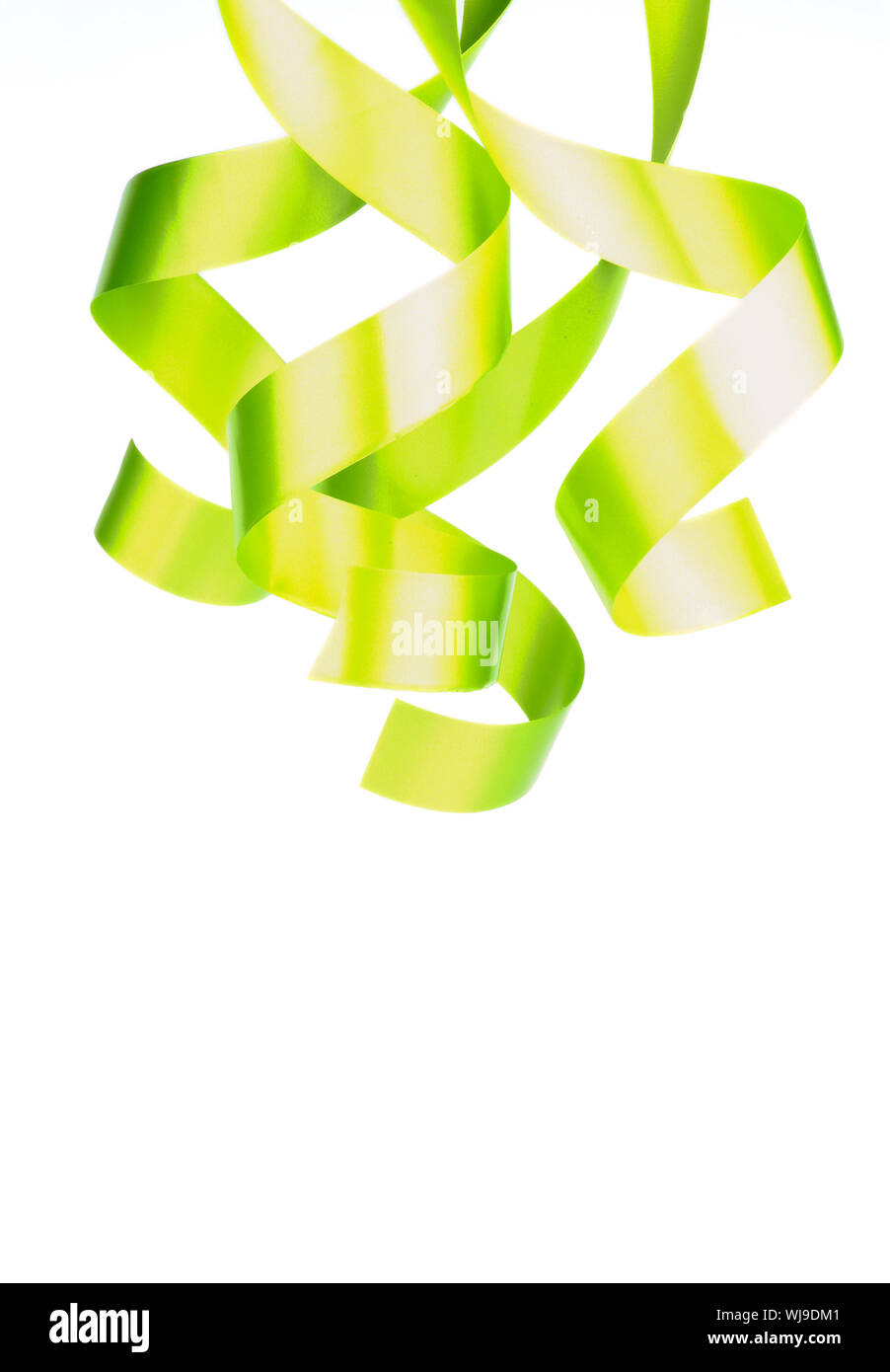 Green Yellow Hanging Down Curly Party Streamers isolated on white ...