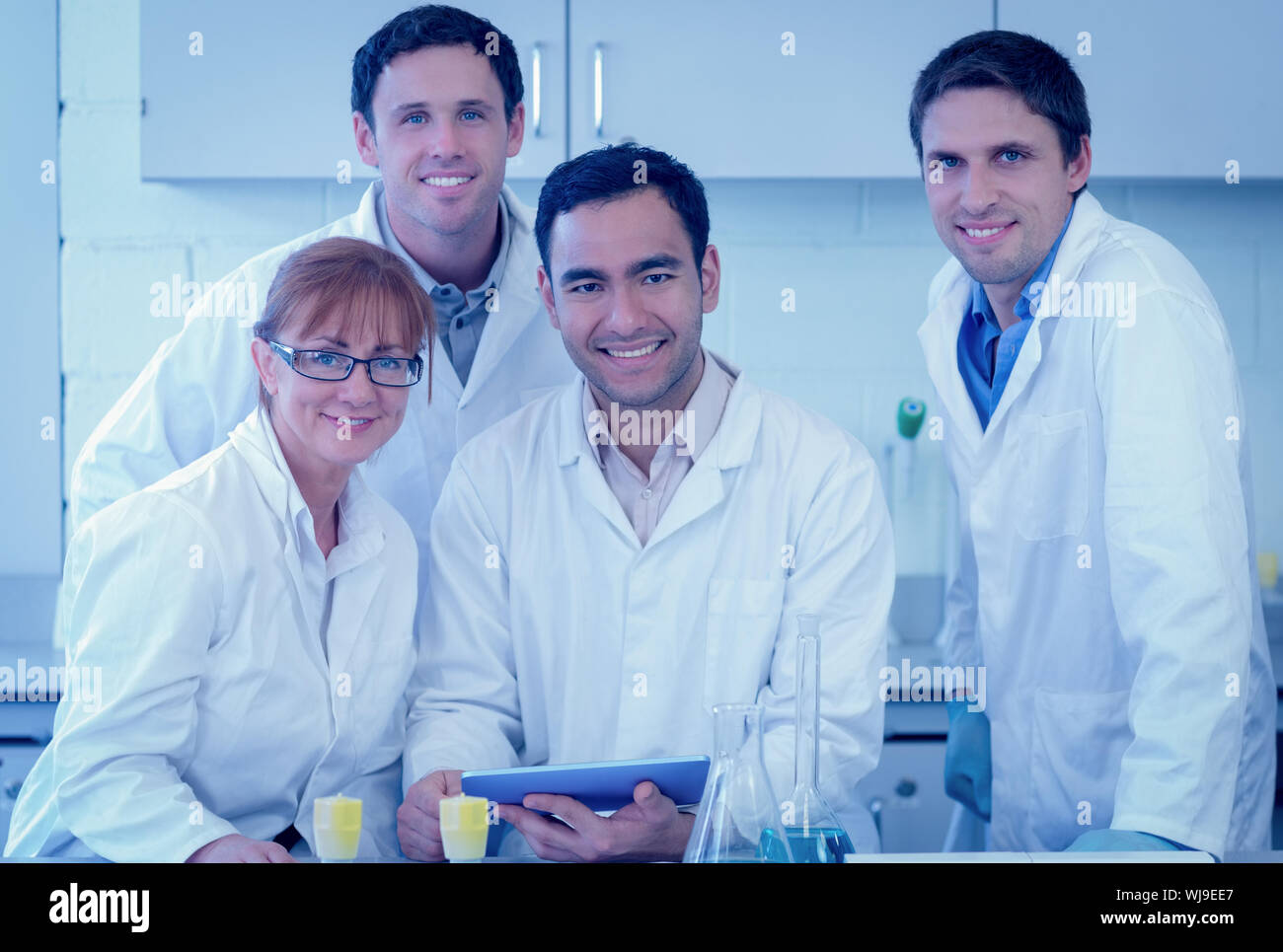 Tablet happy scientists in hi-res stock photography and images - Alamy