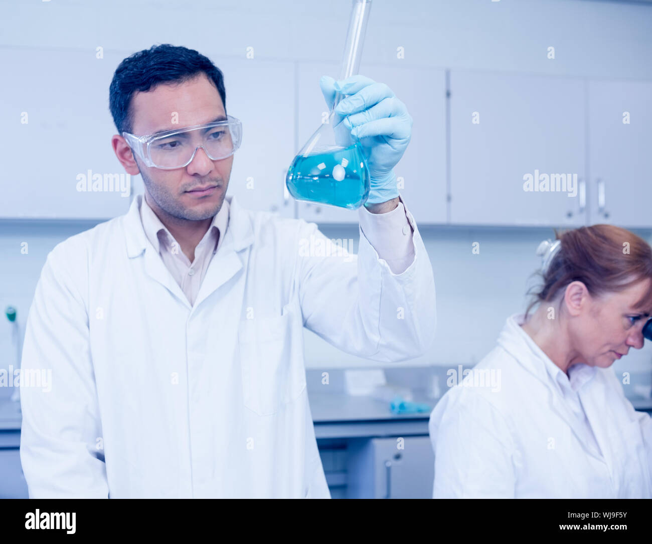 Mature male researcher carrying hi-res stock photography and images - Alamy