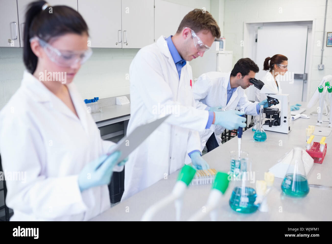 Researchers carrying out scientific hi-res stock photography and images ...