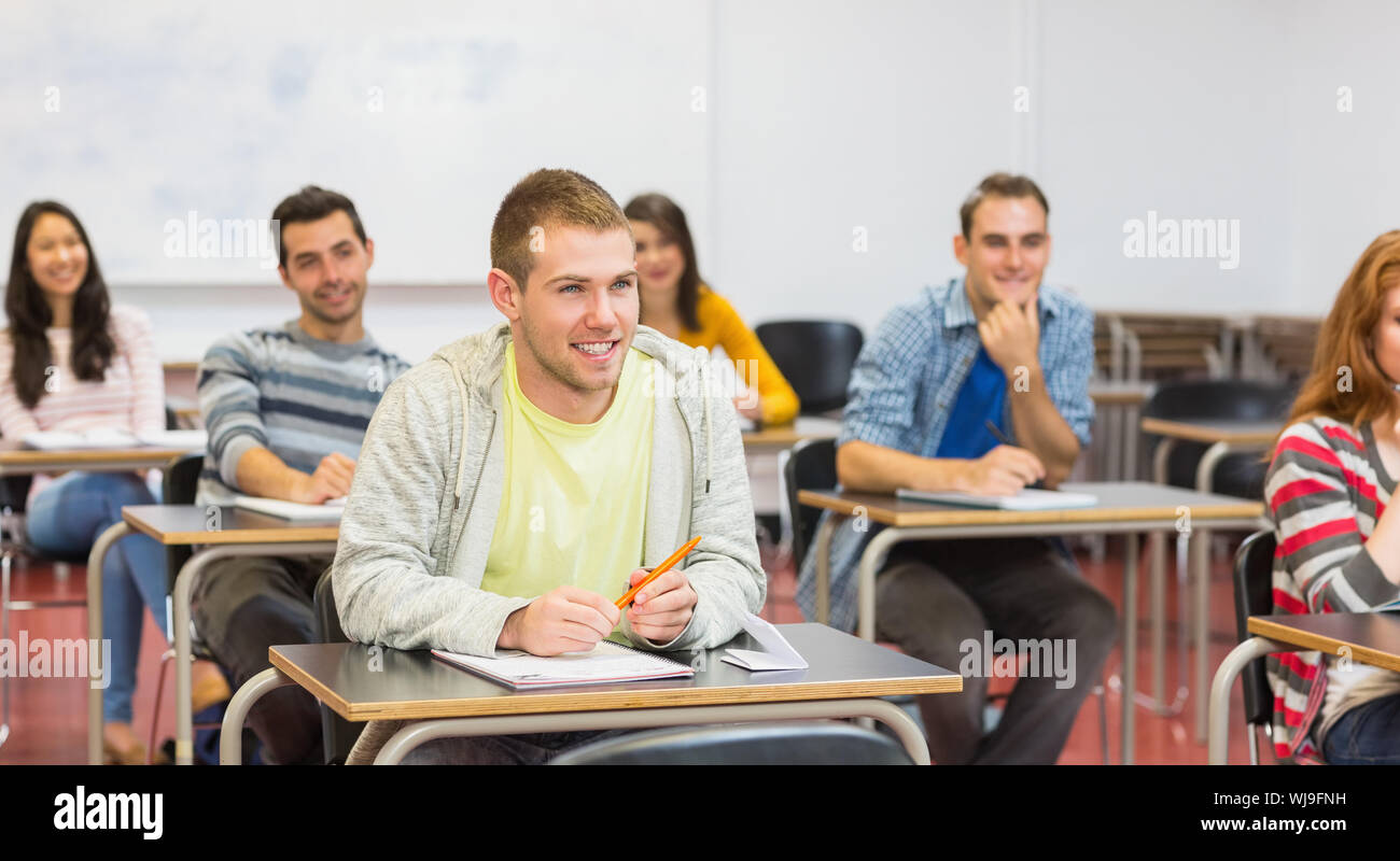 Group of young students smiling in the college classroom Stock Photo ...