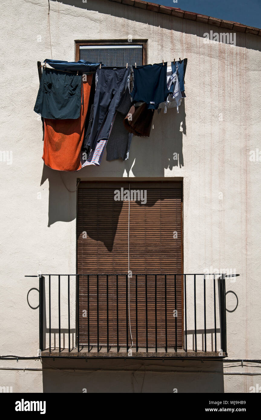 Clothes in balcony hi-res stock photography and images - Alamy