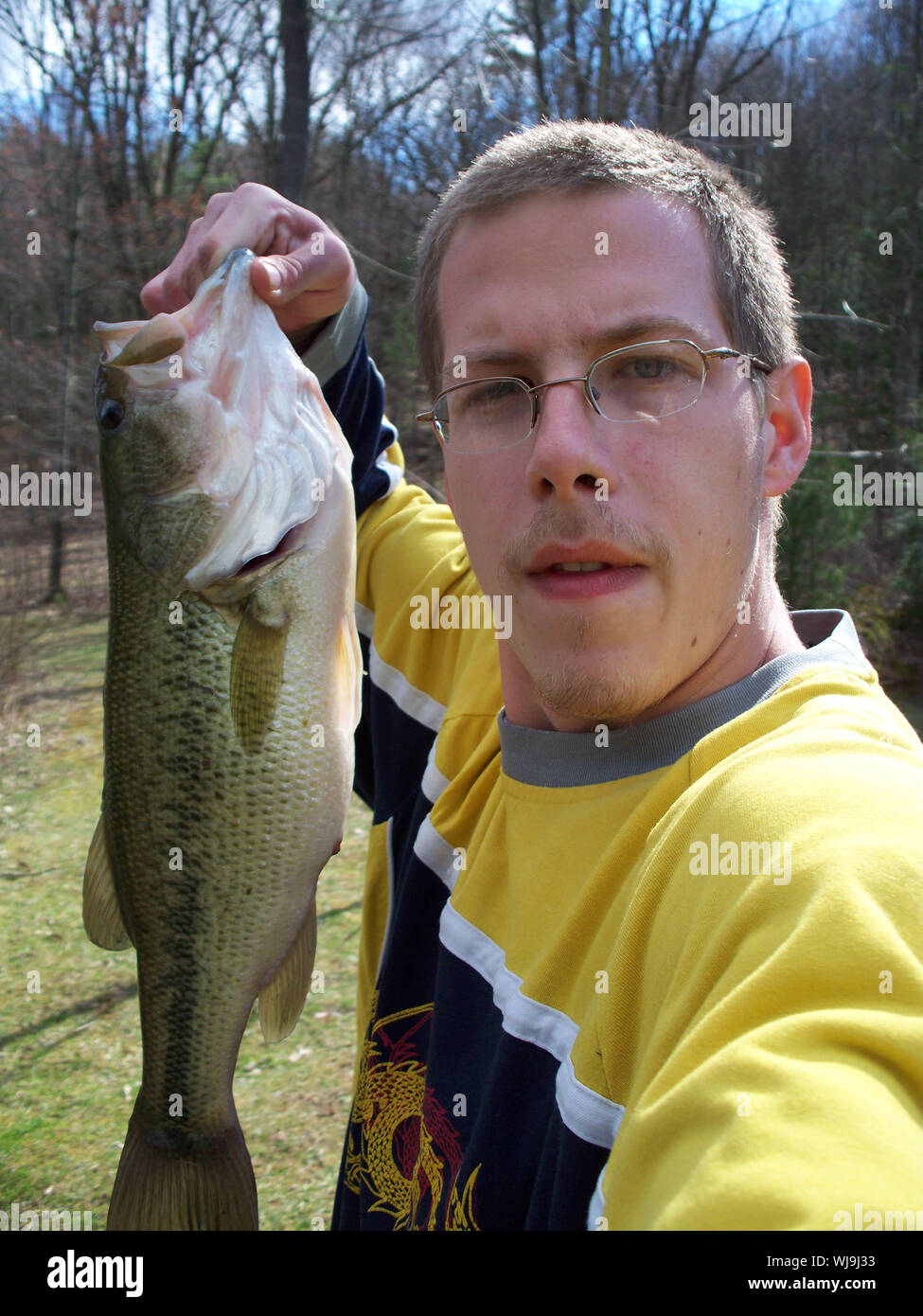 Man holding dead fish hi-res stock photography and images - Alamy
