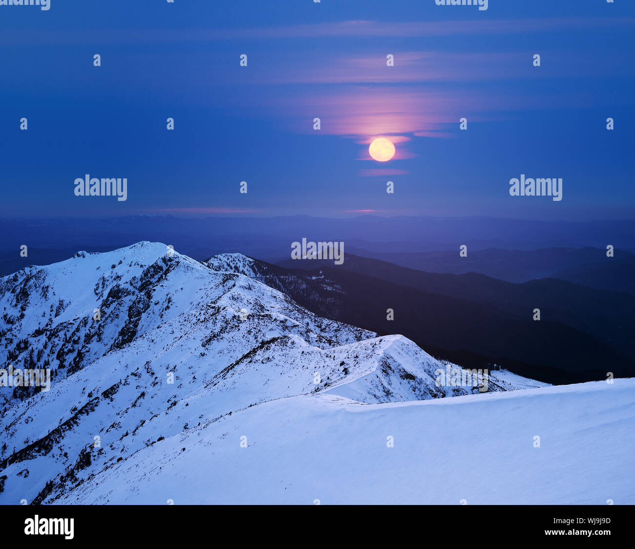 Full moon over snowy mountain hi-res stock photography and images - Alamy