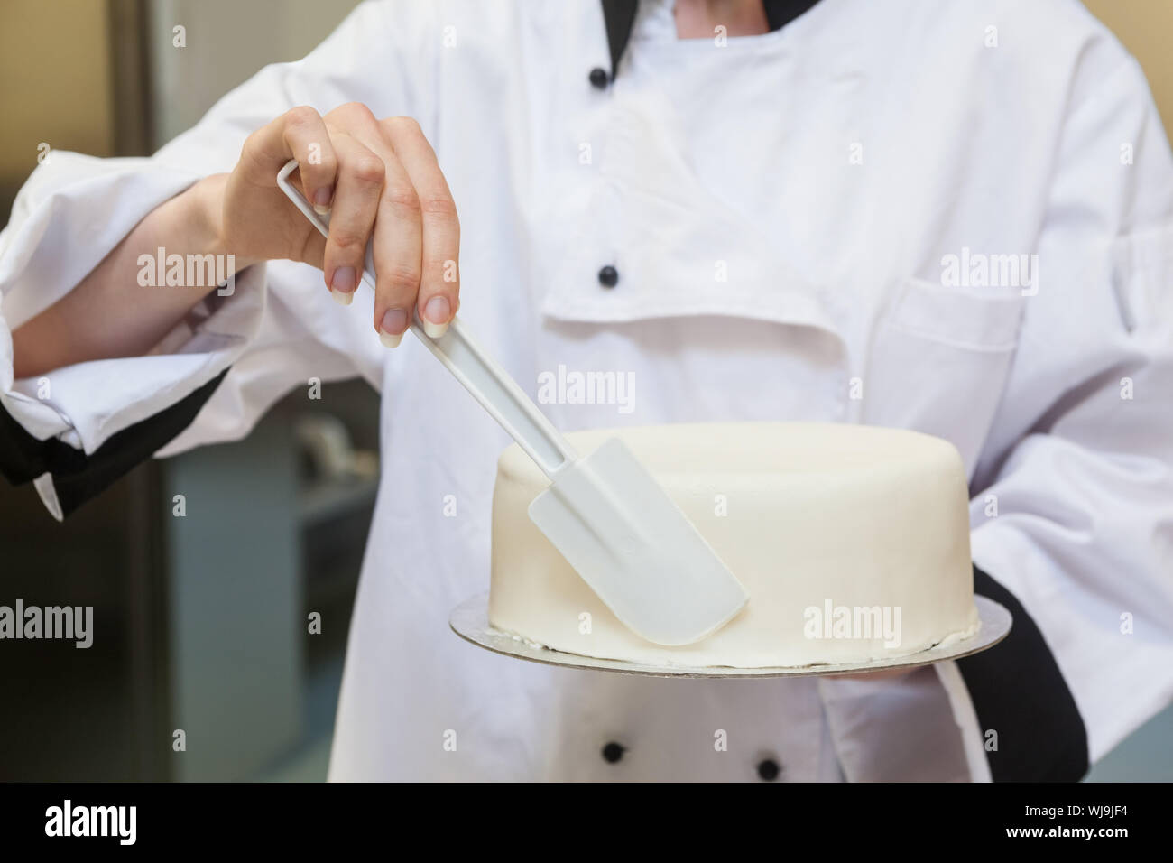 Making cake in commercial kitchen hi-res stock photography and images ...
