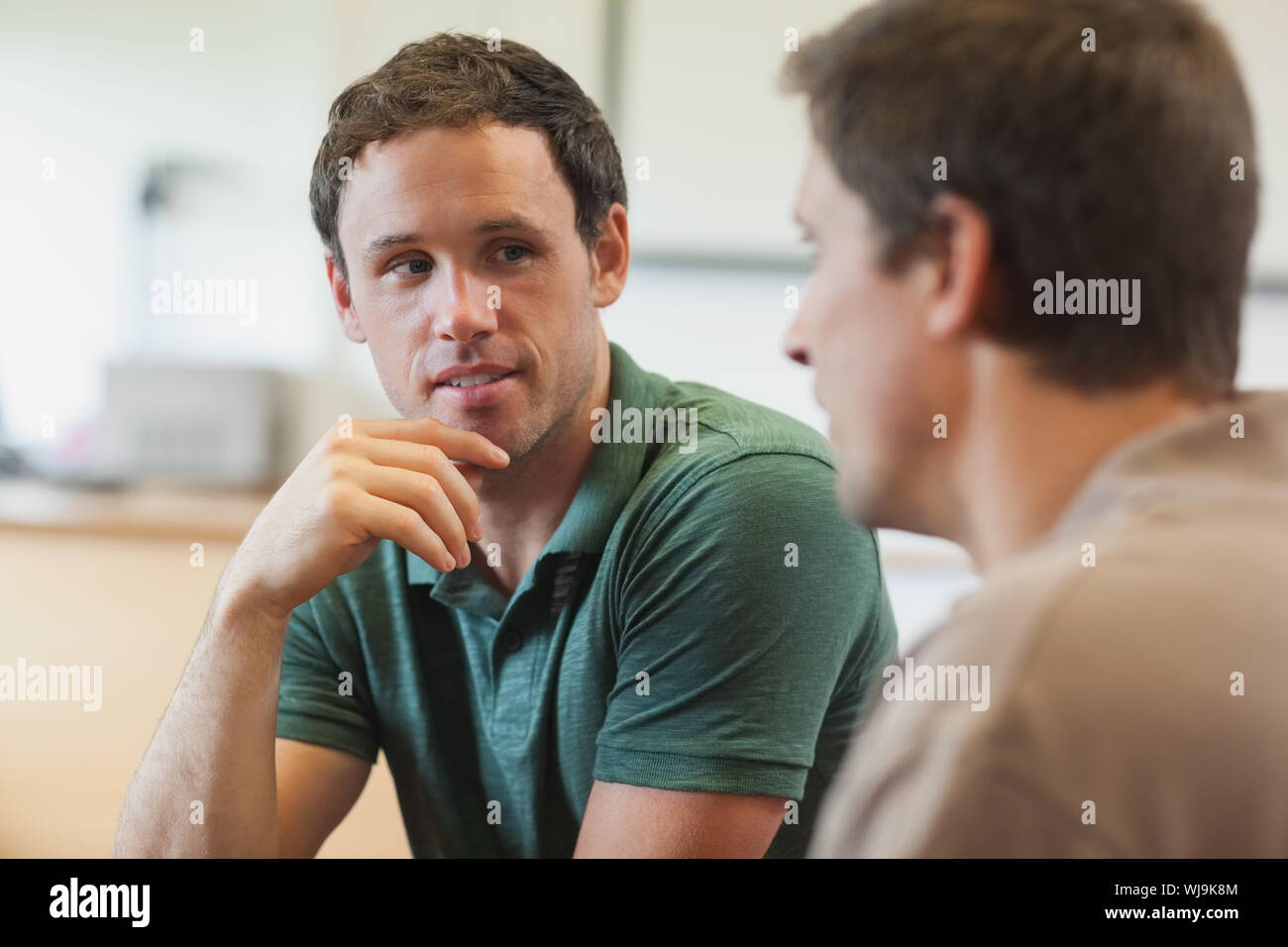 Two students conversation classroom hi-res stock photography and images ...