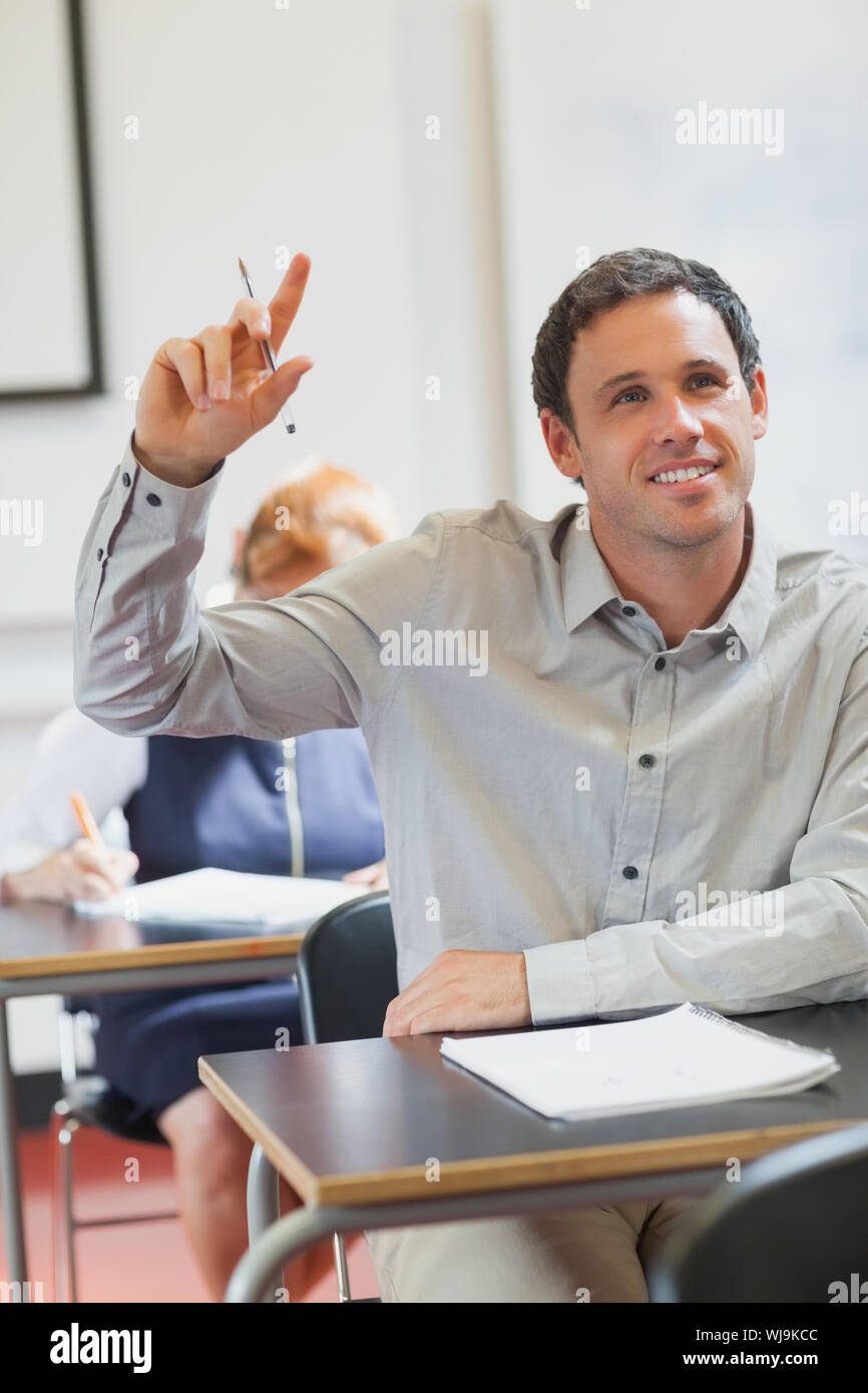 Mature woman hand up class hi-res stock photography and images - Alamy