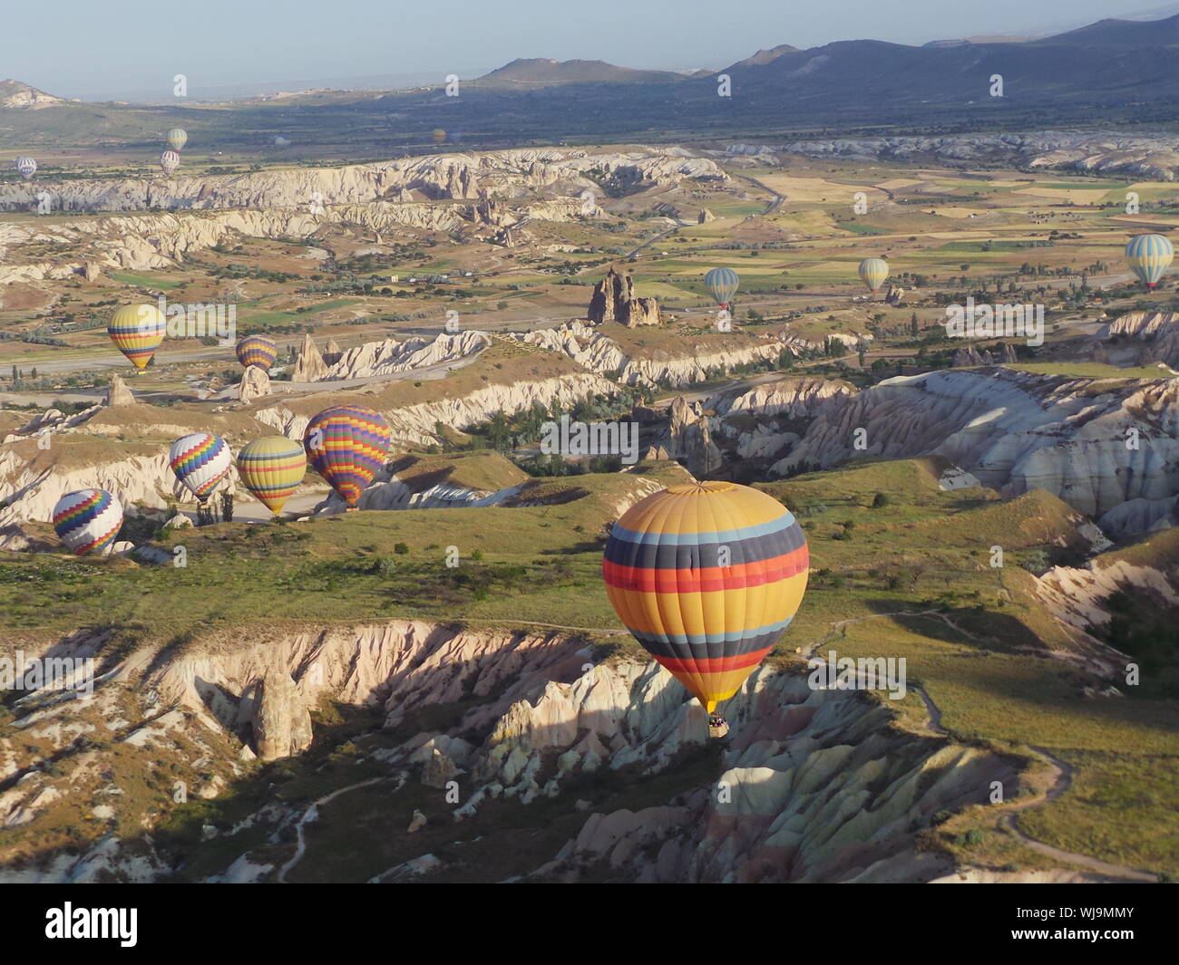 Hot air balloon over rural landscape hi-res stock photography and ...