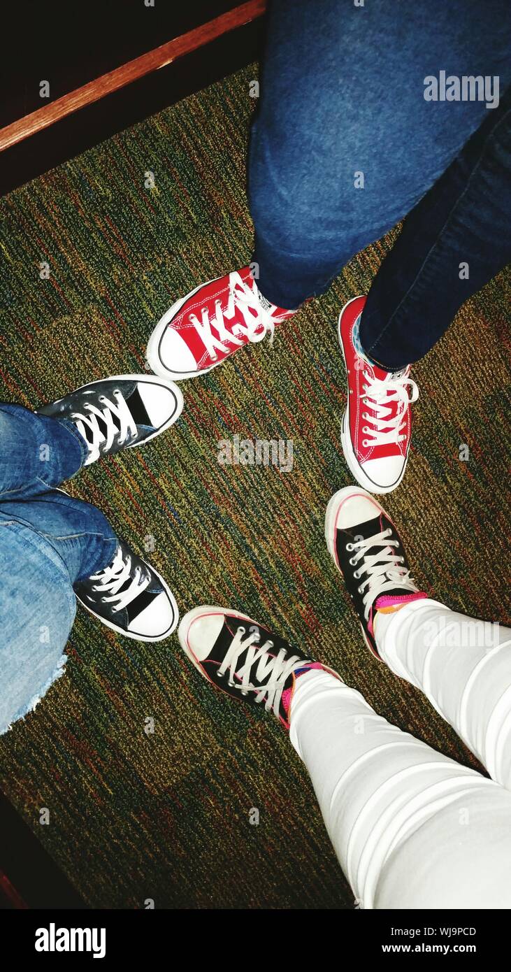 Three people together hi-res stock photography and images - Alamy