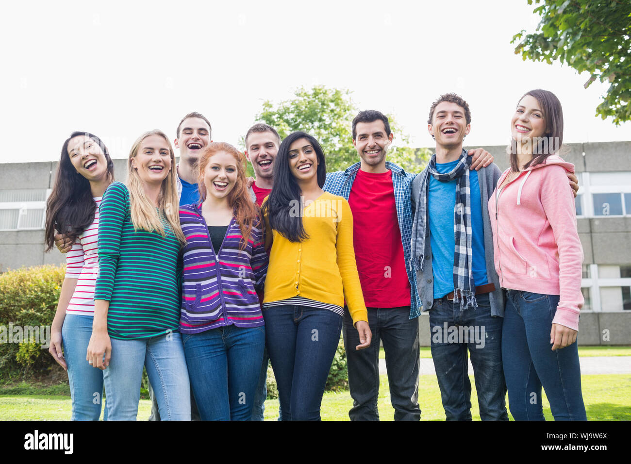 Group portrait of young college students standing in the park Stock ...