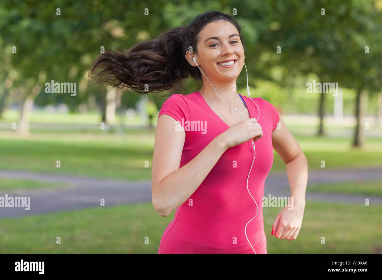 Pretty woman jogging hi-res stock photography and images - Alamy
