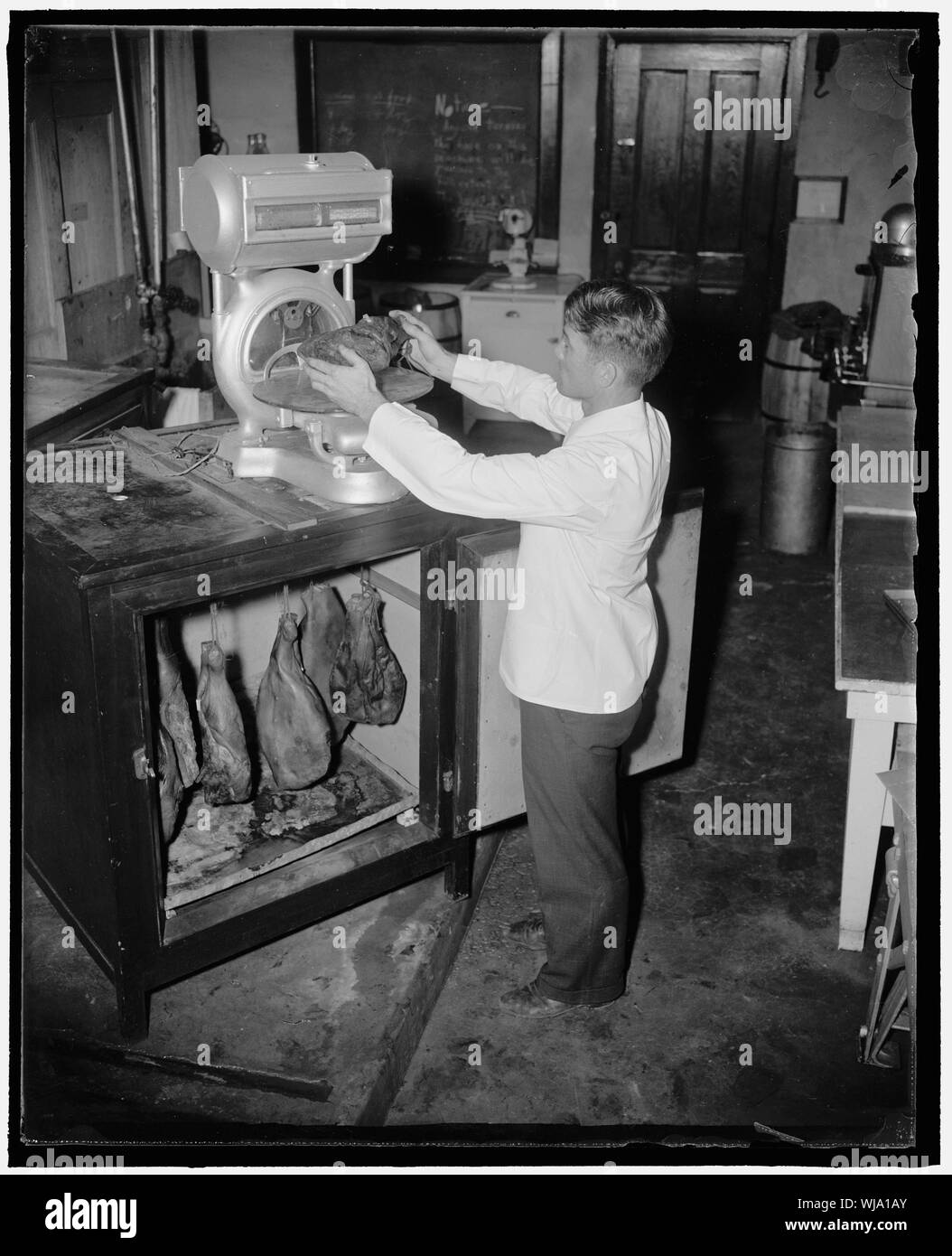 Meat production process Black and White Stock Photos & Images - Alamy