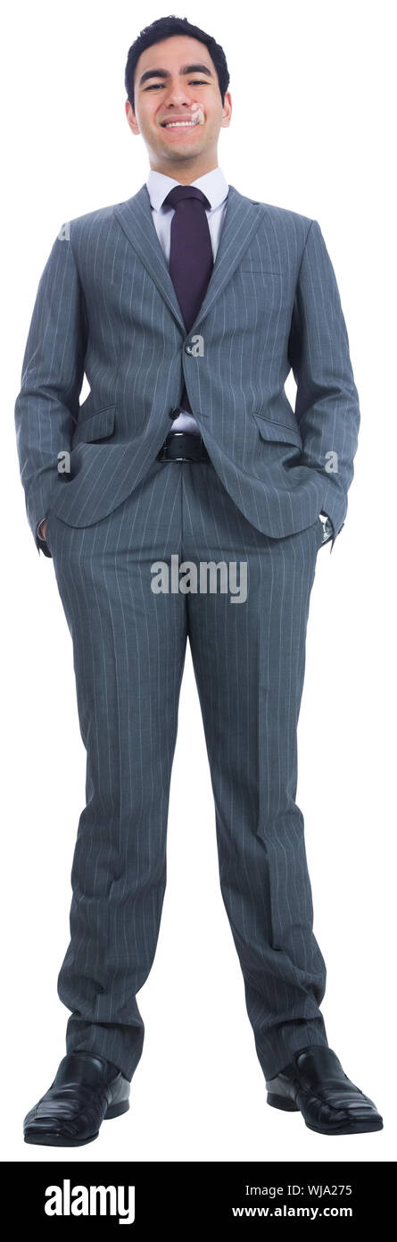 Smiling businessman standing Stock Photo - Alamy
