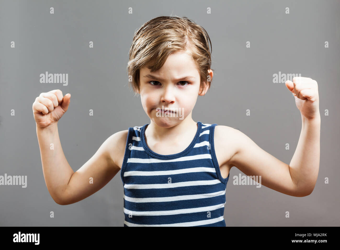 Boys showing muscles hi-res stock photography and images - Alamy