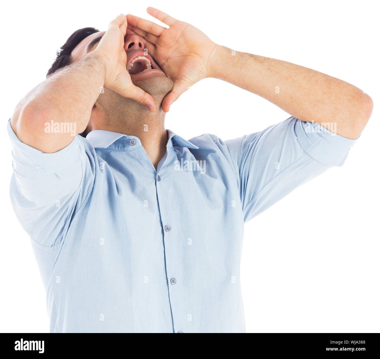 Shouting casual man standing Stock Photo - Alamy